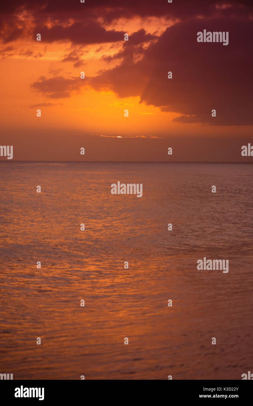 Sunset on the coast of the Caribbean Sea. Dominican sunset Stock Photo ...