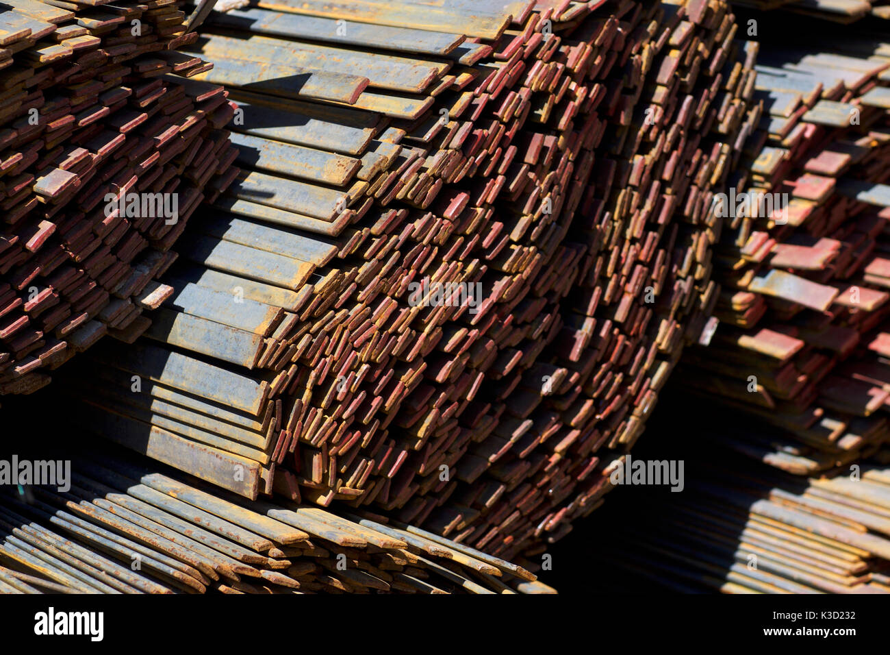 Metal profile strip in packs at the warehouse of metal products, Russia ...