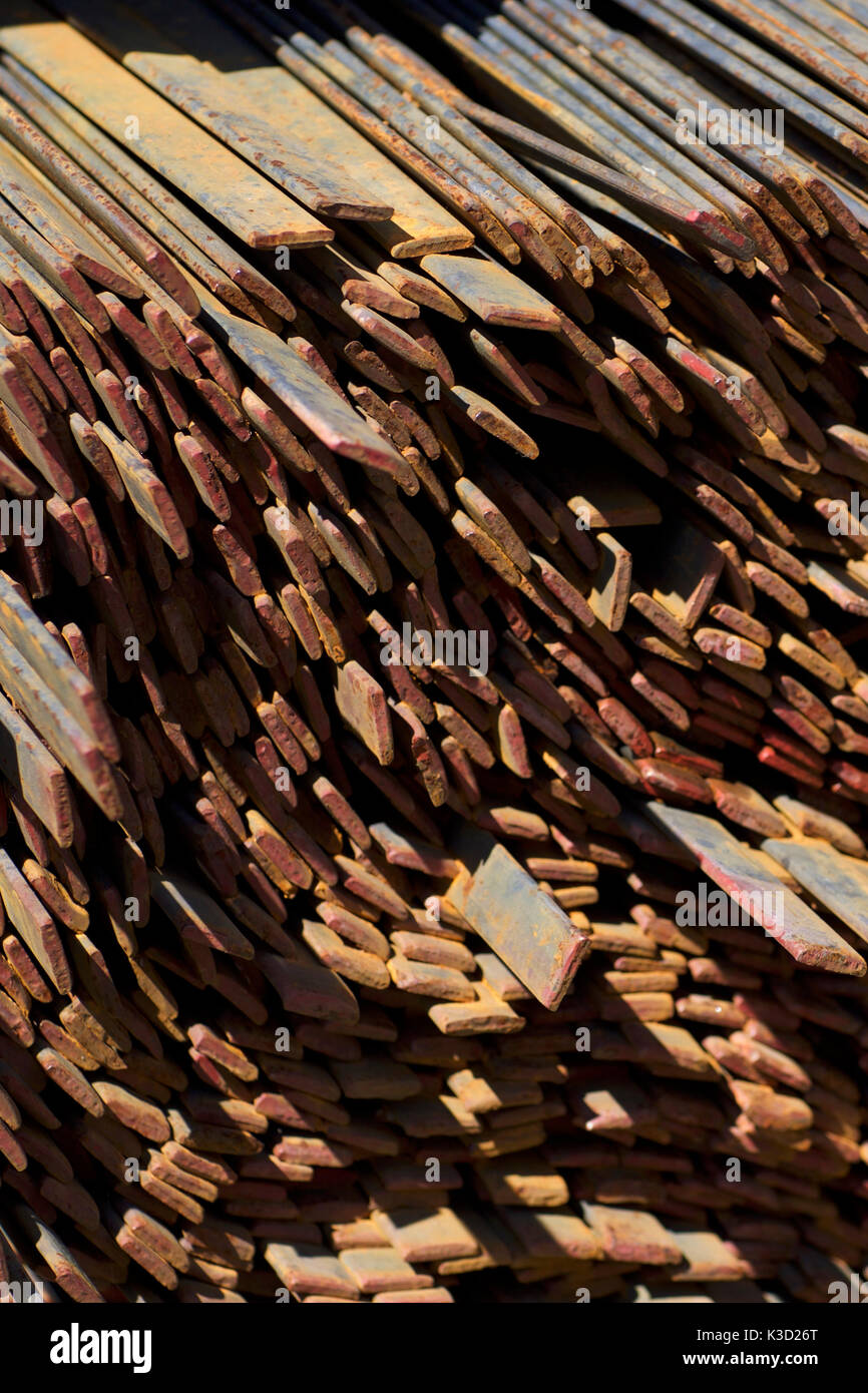 Metal profile strip in packs at the warehouse of metal products, Russia ...