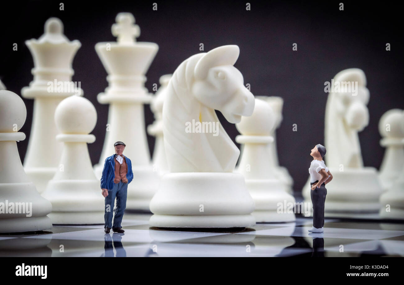 Men thumbnail within a game of chess, concept Stock Photo - Alamy