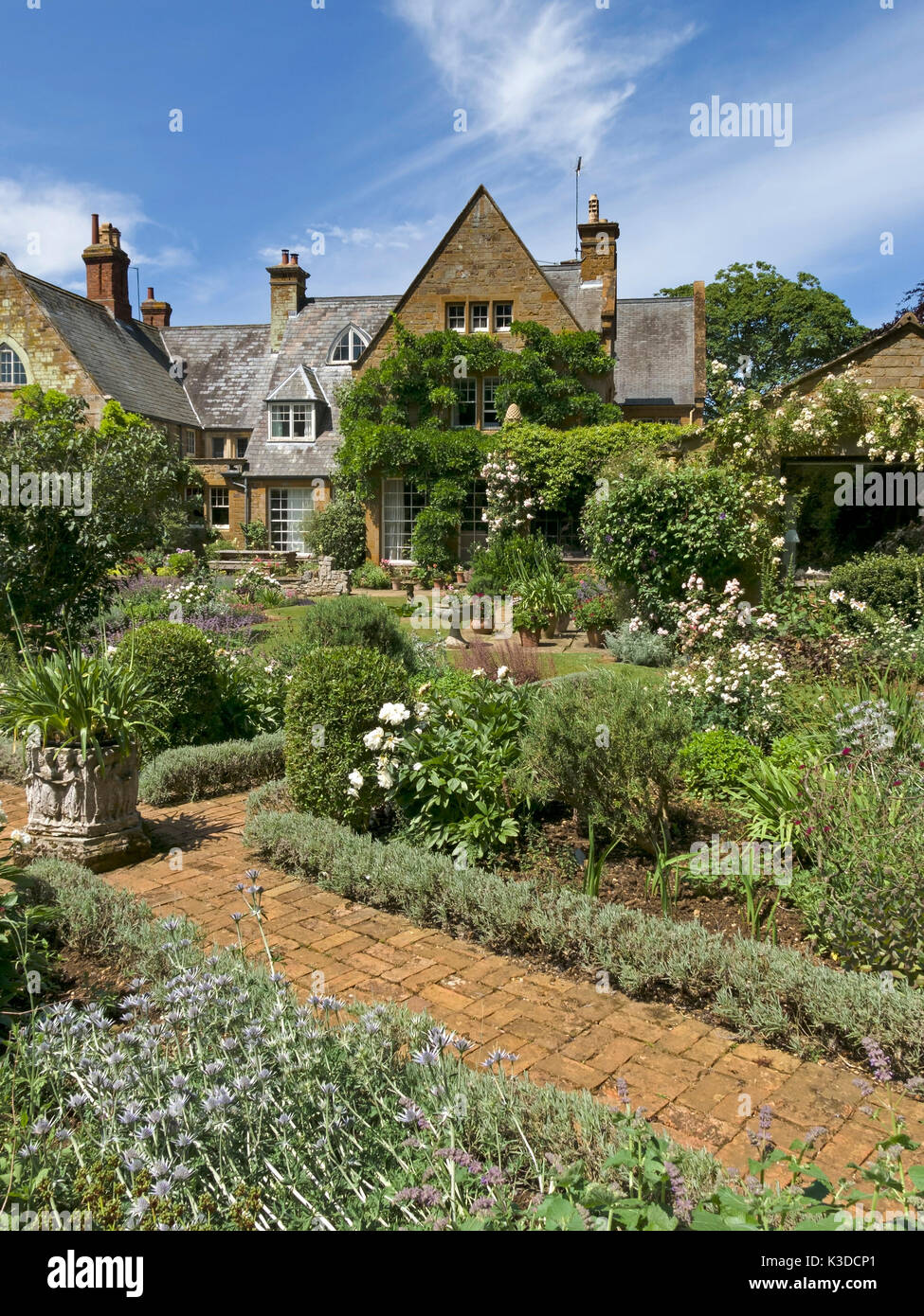 Coton Manor House and landscaped gardens, Northamptonshire, England, UK ... Coton Manor House and landscaped gardens, Northamptonshire, England, UK ...