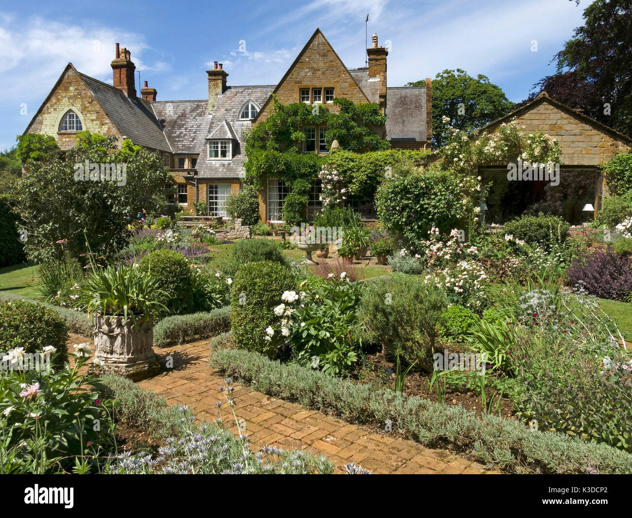 Coton Manor House and landscaped gardens, Northamptonshire, England, UK ...