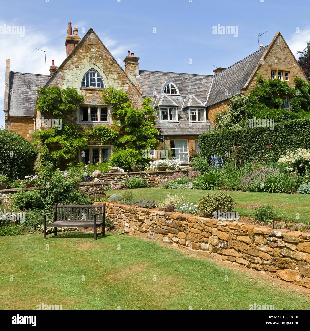 Coton Manor House and landscaped gardens, Northamptonshire, England, UK ... Coton Manor House and landscaped gardens, Northamptonshire, England, UK ...