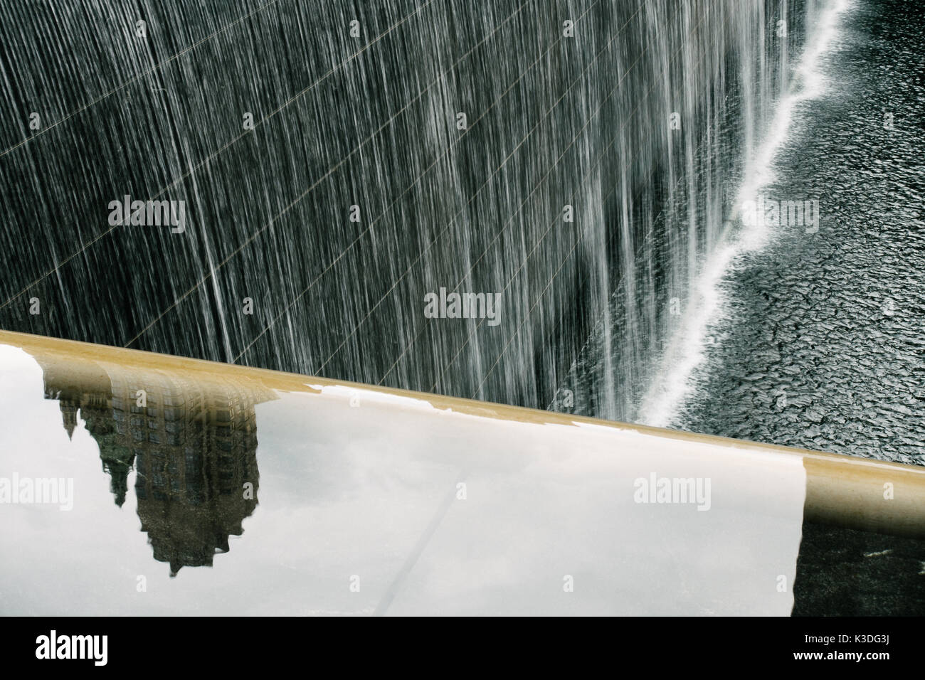 Building reflected in one of the reflecting pools at the National ...
