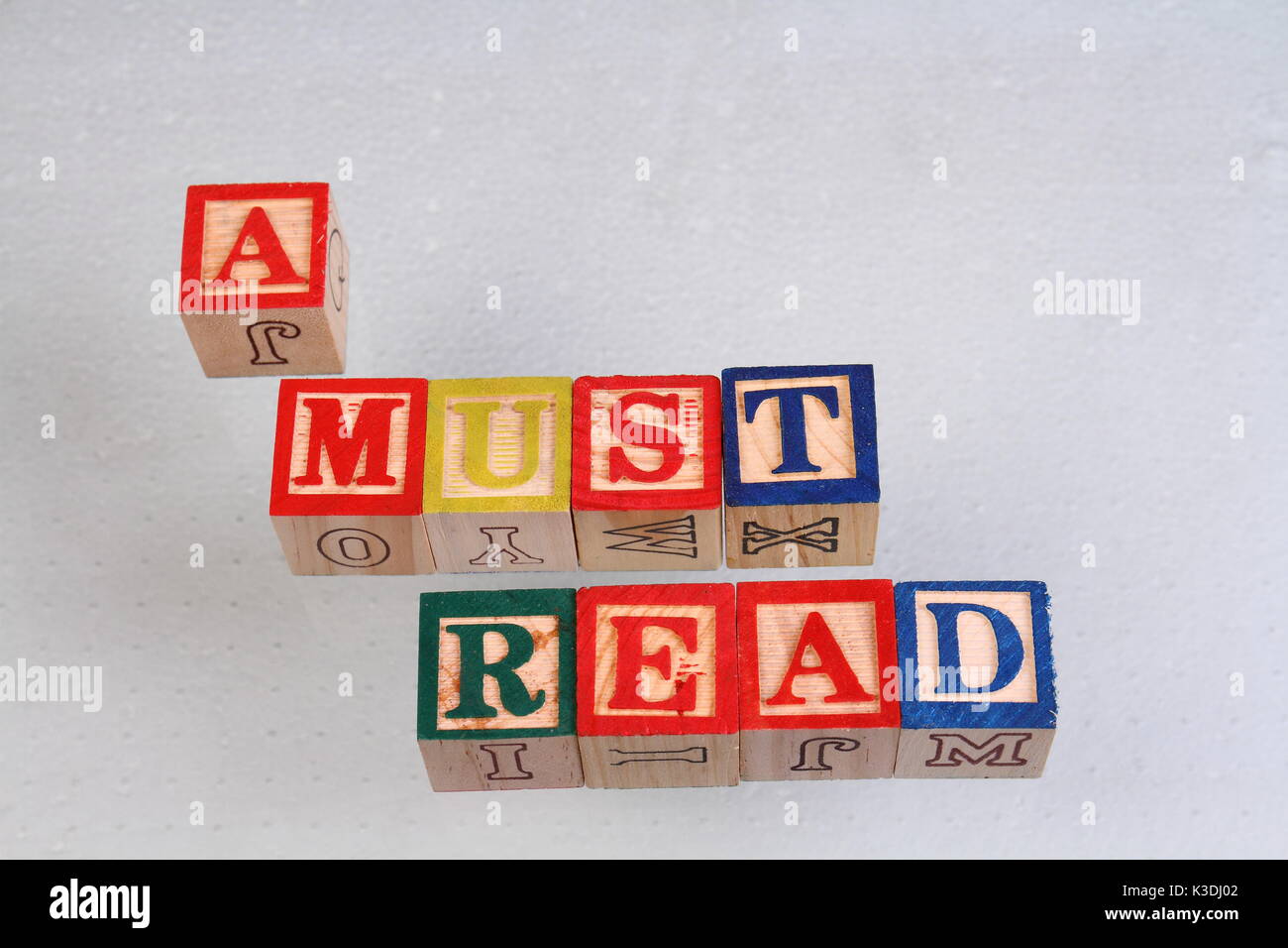The term a must read displayed visually on a white background using ...