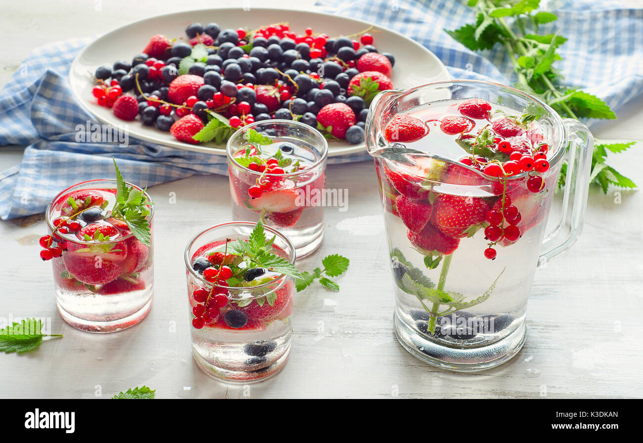 Infused water with fresh berries. Healthy diet concept Stock Photo - Alamy