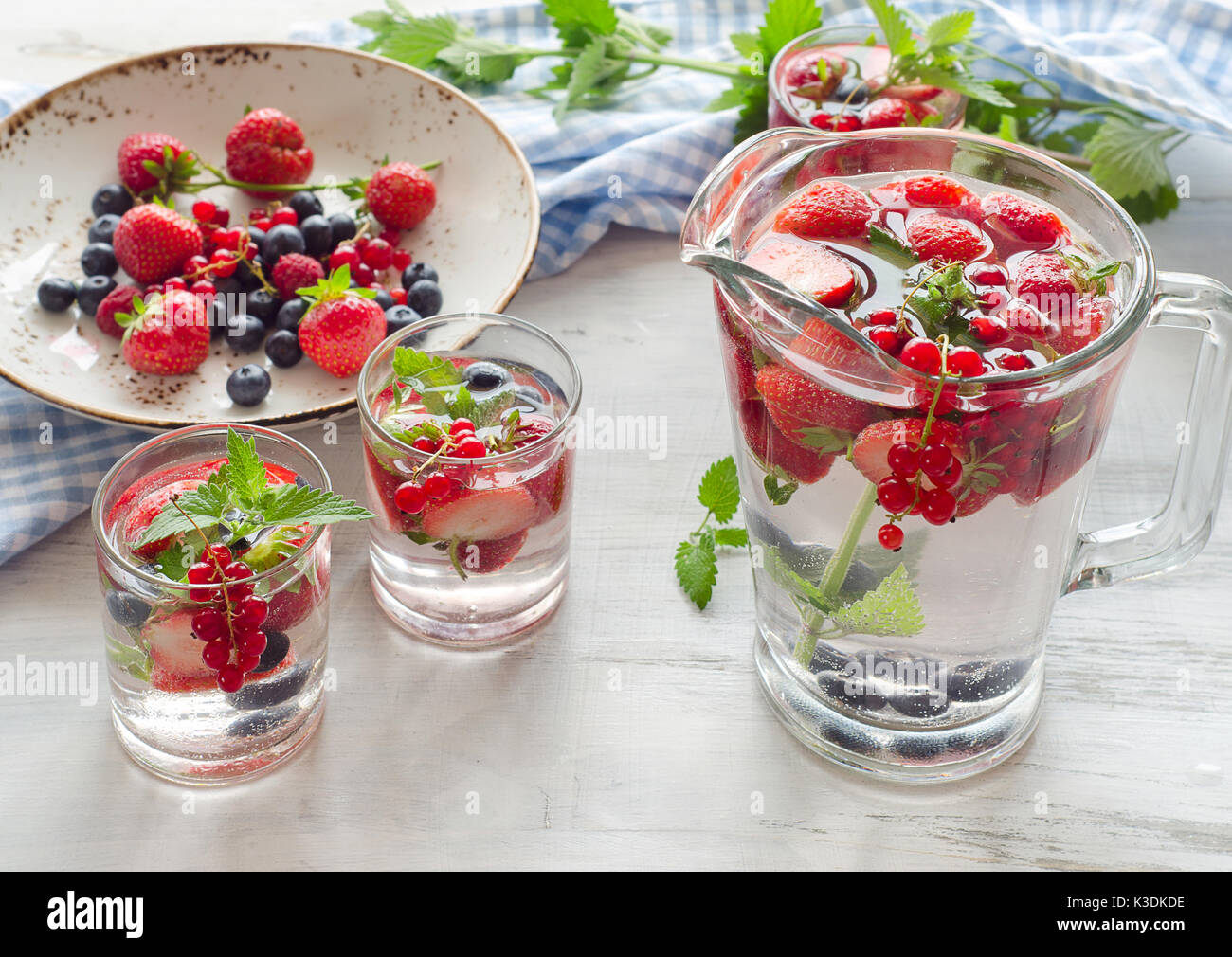 Infused water with fresh berries. Healthy diet concept Stock Photo - Alamy