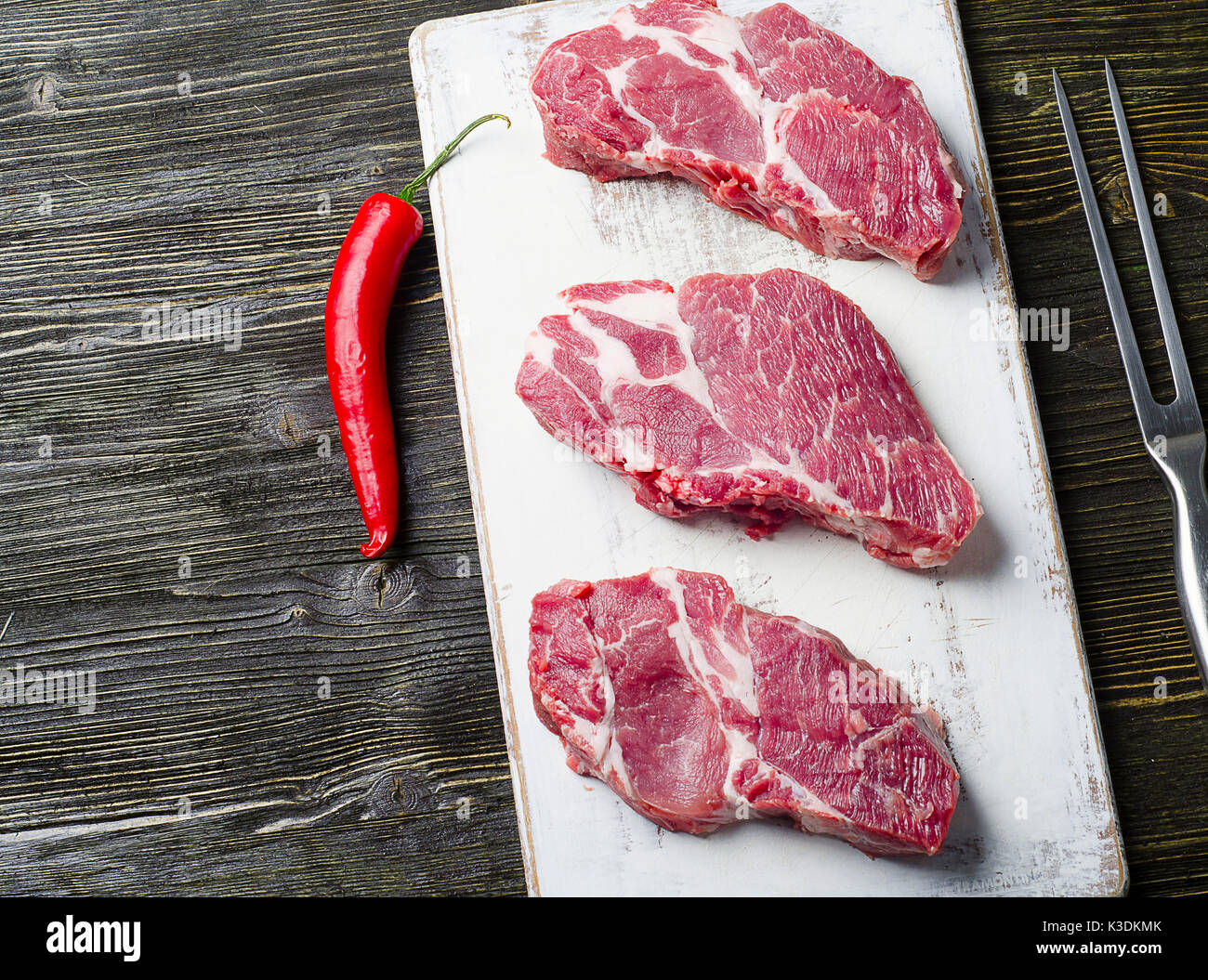 Raw pork steaks hi-res stock photography and images - Alamy