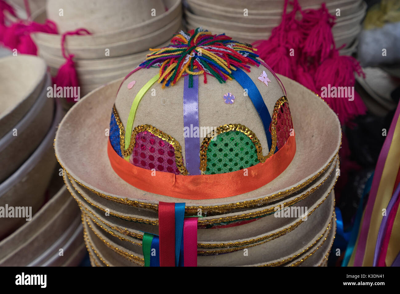 decorated traditional quechua felt hat in the Otavalo artisan market ...