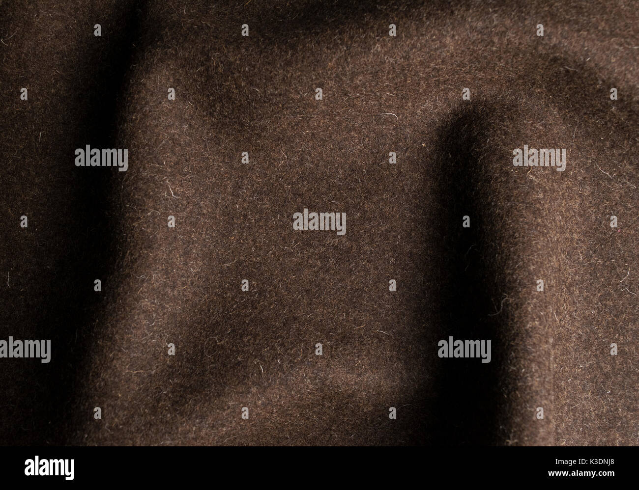 Crumpled felt fabric texture of natural brown fabric, cloth and ...