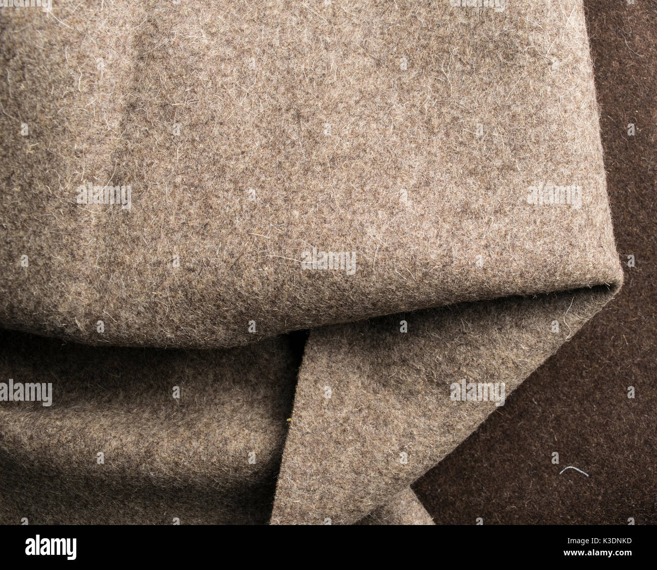 Crumpled felt fabric texture of natural brown fabric, cloth and ...