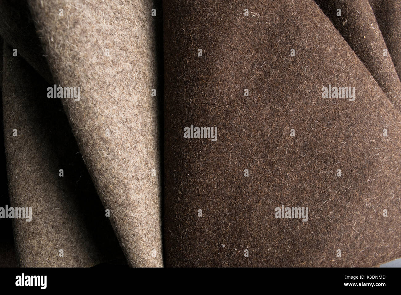 Crumpled felt fabric texture of natural brown fabric, cloth and ...