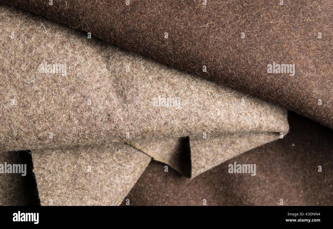 Crumpled felt fabric texture of natural brown fabric, cloth and ...