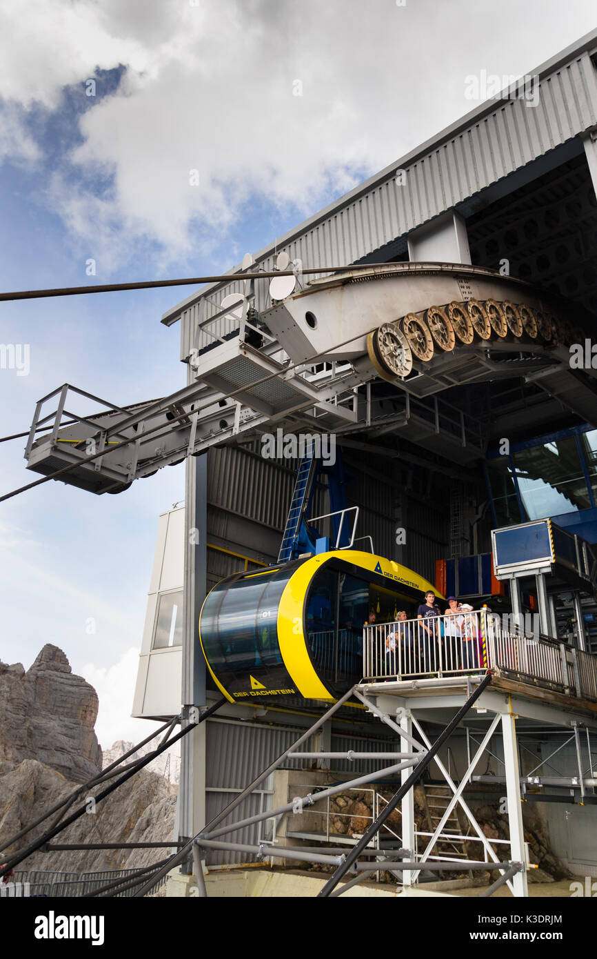 RAMSAU AM DACHSTEIN, AUSTRIA - AUGUST 17: Gondola with tourists in the ...