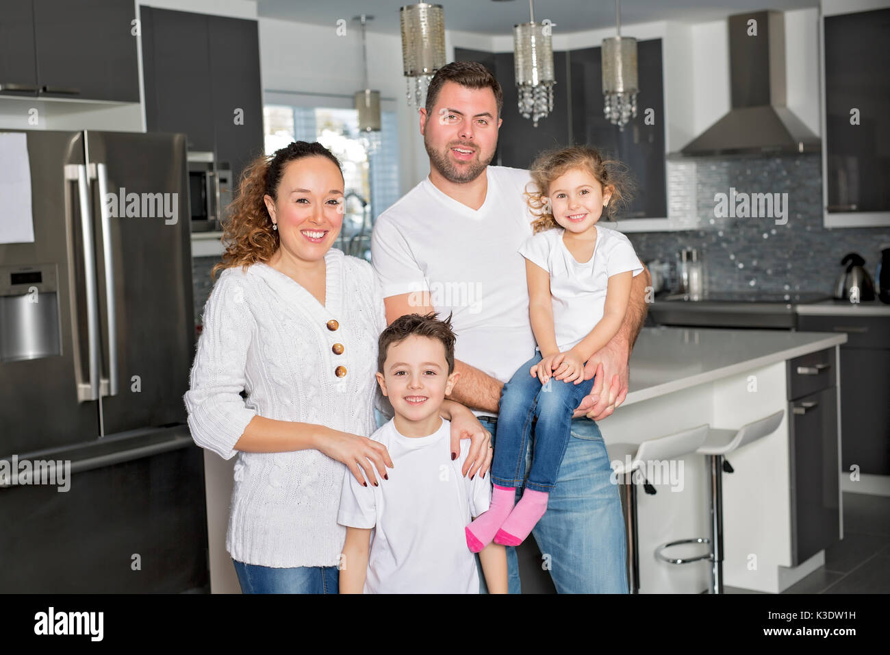 Portrait affectionate family four hi-res stock photography and images ...