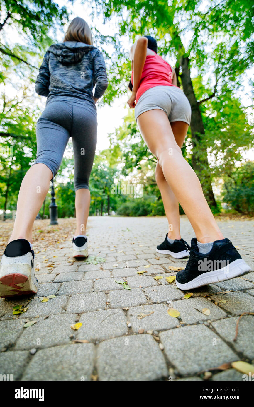 Female jogger jogging in sunshine hi-res stock photography and images ...