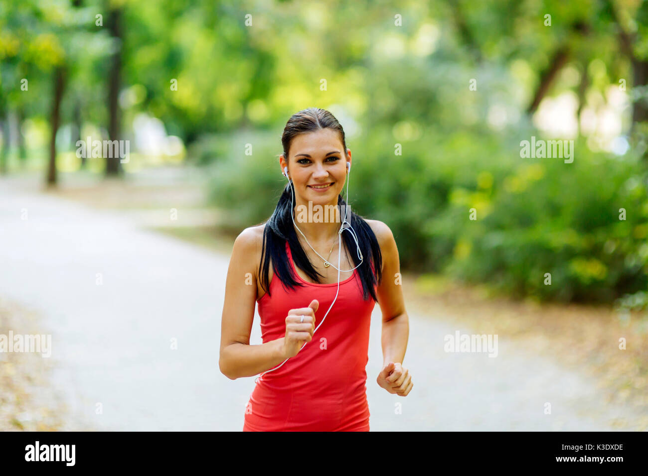 Girl run trees hi-res stock photography and images - Alamy