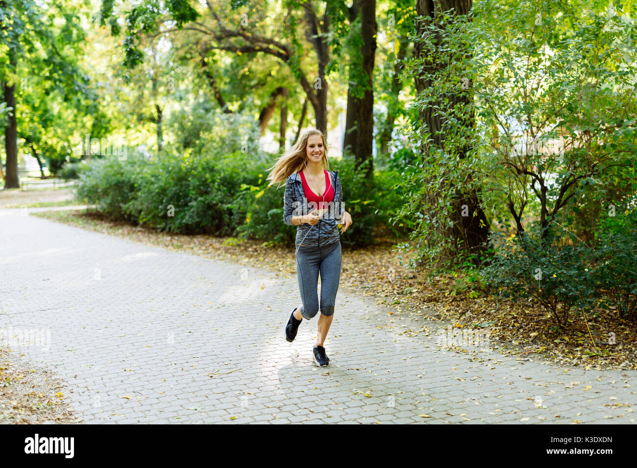 Young blonde woman jogging Stock Photo - Alamy Young blonde woman jogging Stock Photo - Alamy