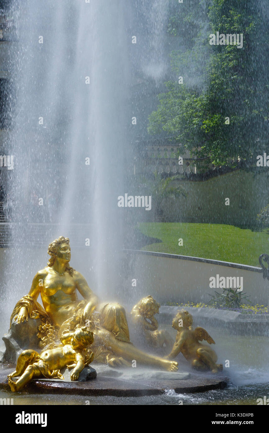 Golden well with water jet in the Schloss Linderhof (castle), Bavaria ...