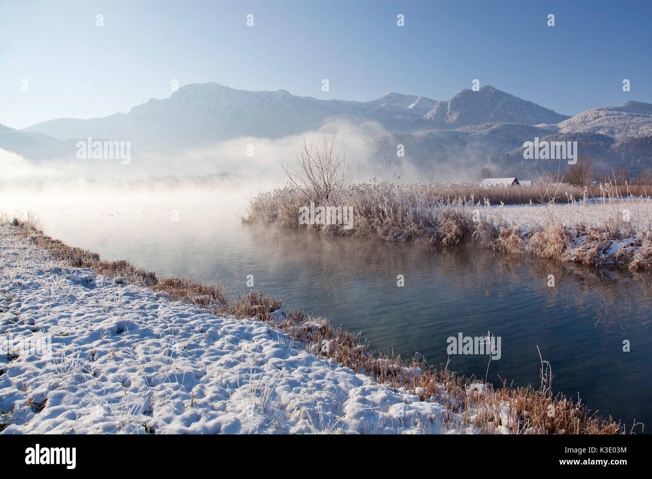 Kochelsee in front of Herzogstand and Heimgarten mountains in winter ...