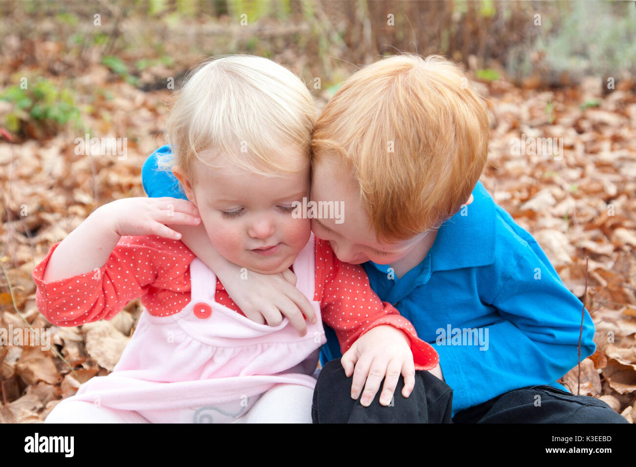 Children hugging in the park Stock Photo - Alamy
