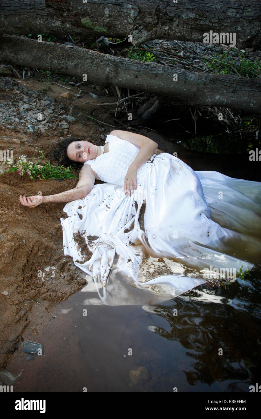 Mud and wedding dress hi-res stock photography and images - Alamy