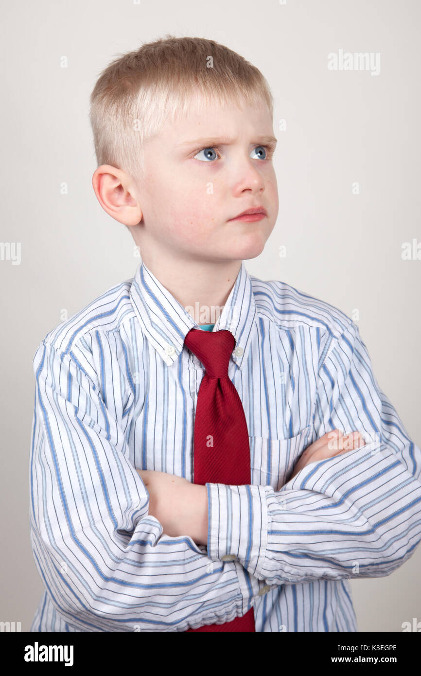 Little boy with crossed arms looks defiant Stock Photo - Alamy Little boy with crossed arms looks defiant Stock Photo - Alamy