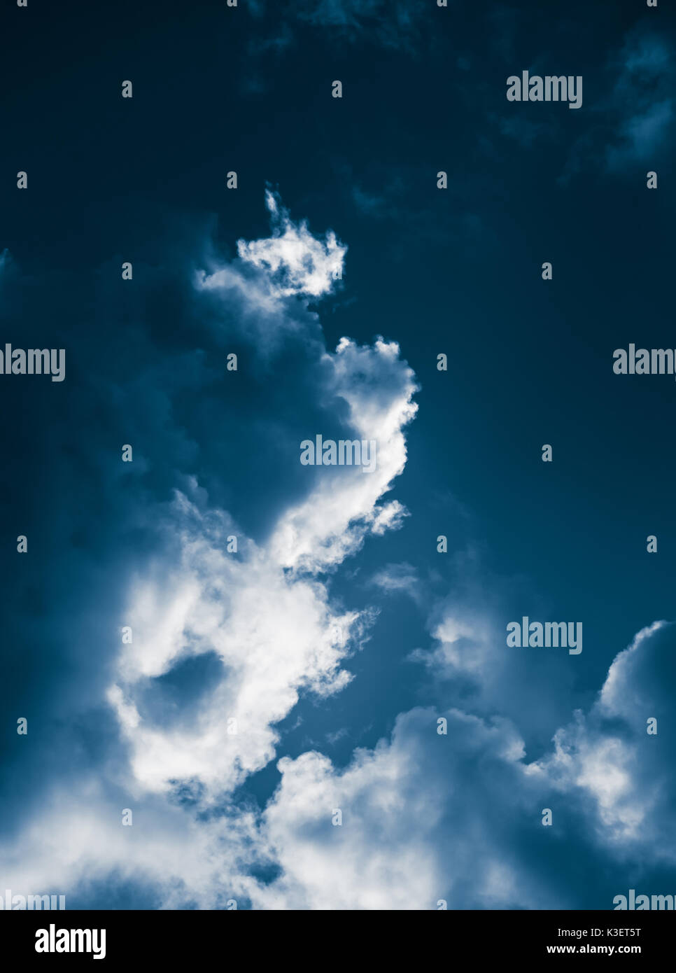 Magnificent storm clouds in the evening sky. High contrast dramatic ...