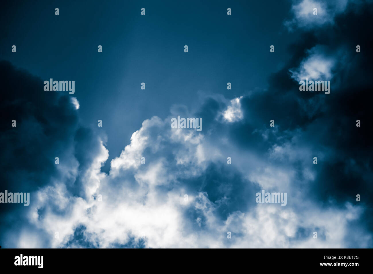 Magnificent storm clouds in the evening sky. High contrast dramatic ...