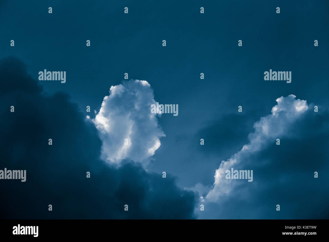 Magnificent storm clouds in the evening sky. High contrast dramatic ...
