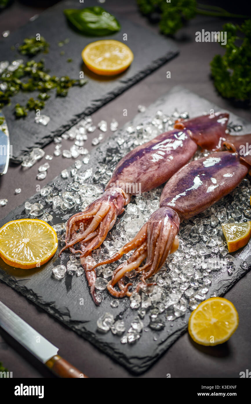 Fresh fish with lemon on ice hi-res stock photography and images - Alamy