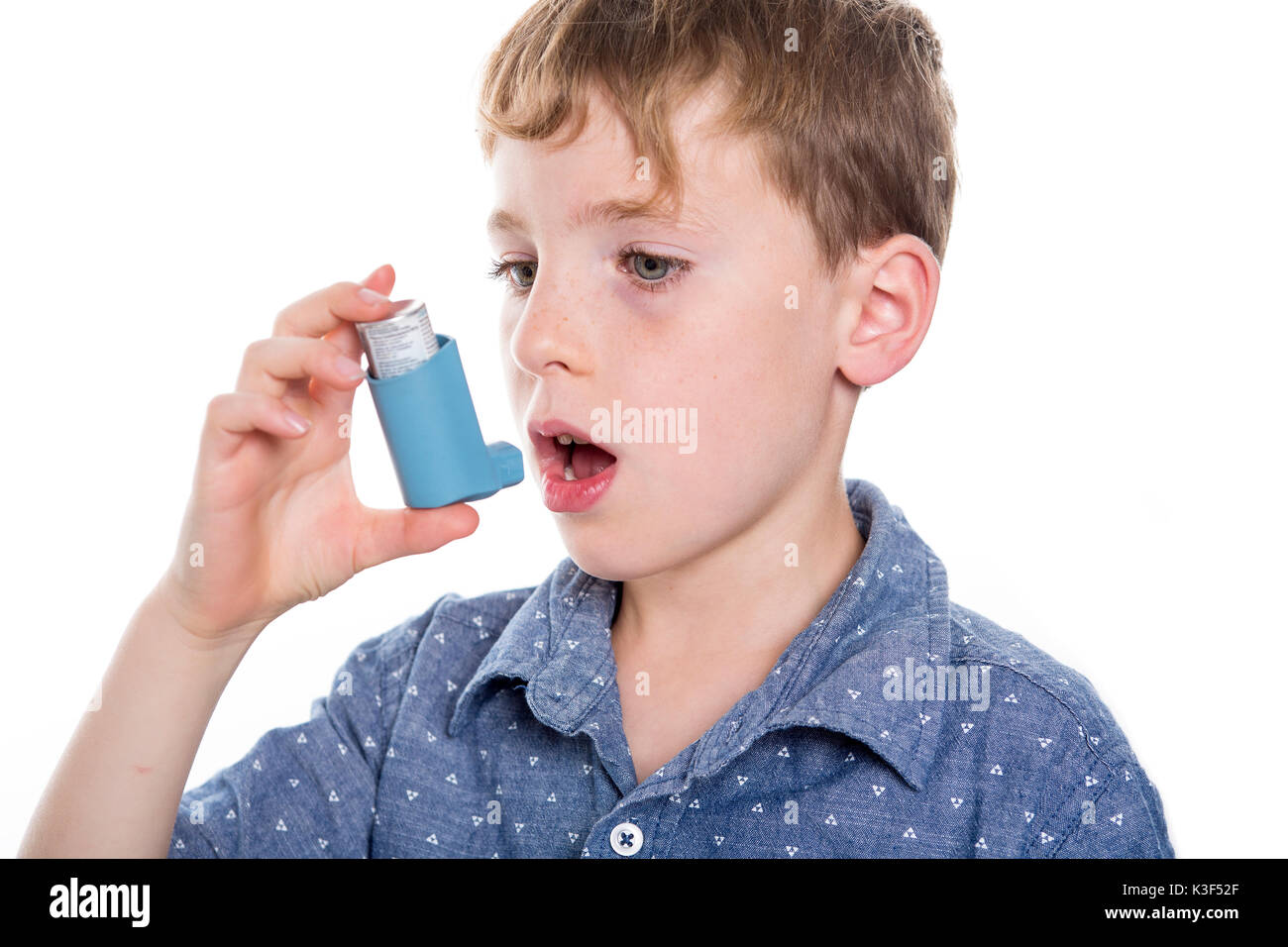 child using inhaler for asthma. White background Stock Photo - Alamy