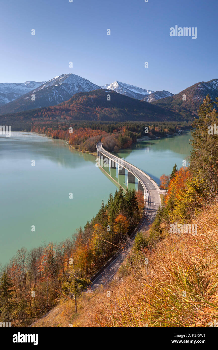 Autumnal mountain forest at the bridge at Sylvenstein Dam, Fall village ...