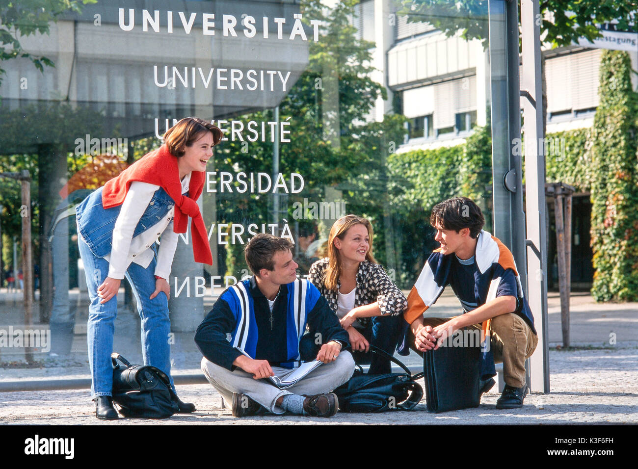 Students in front of university building Stock Photo - Alamy