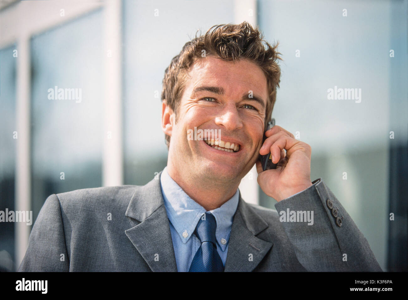 Businessman with mobile hi-res stock photography and images - Alamy