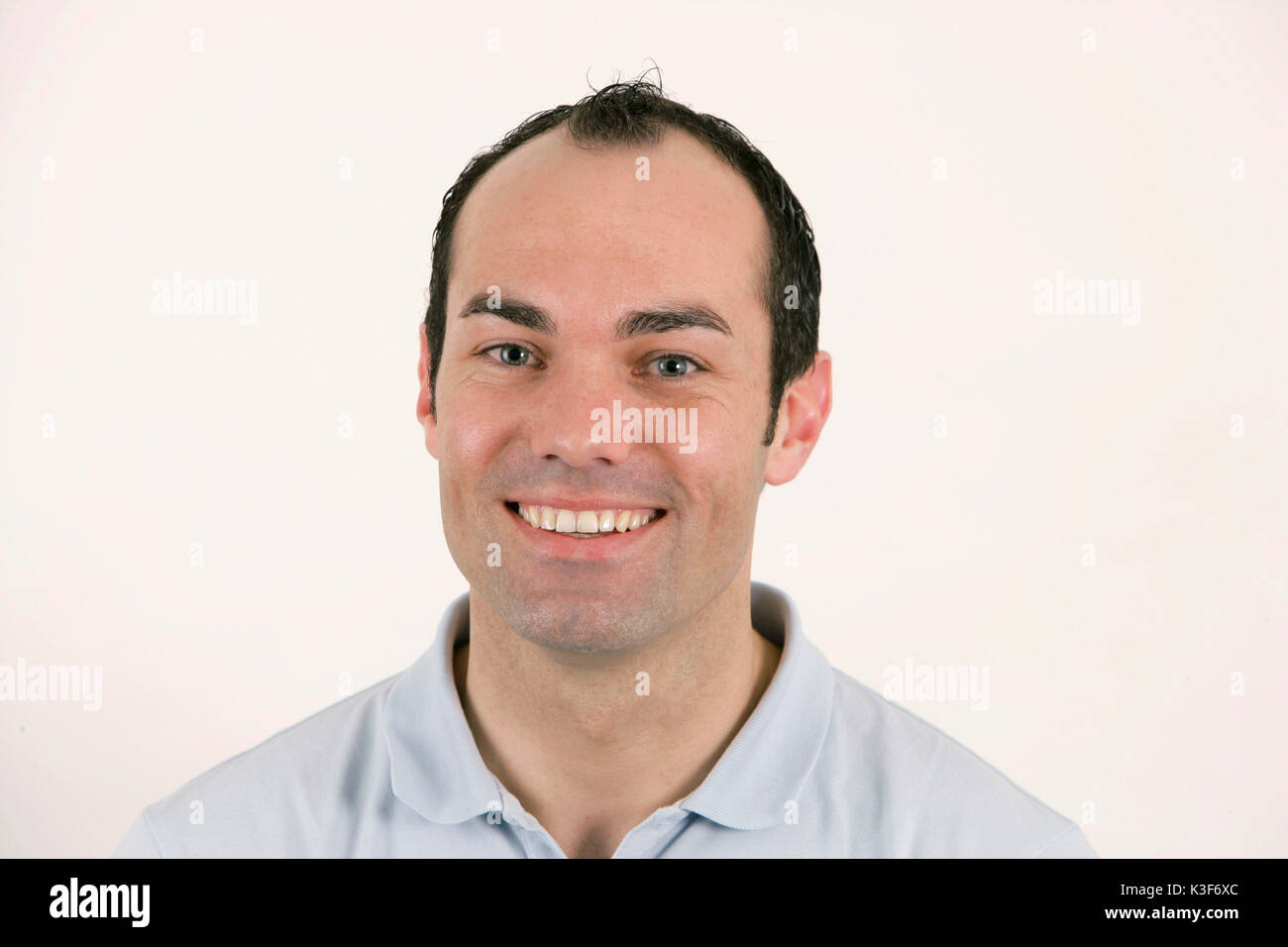 Half bald hi-res stock photography and images - Alamy