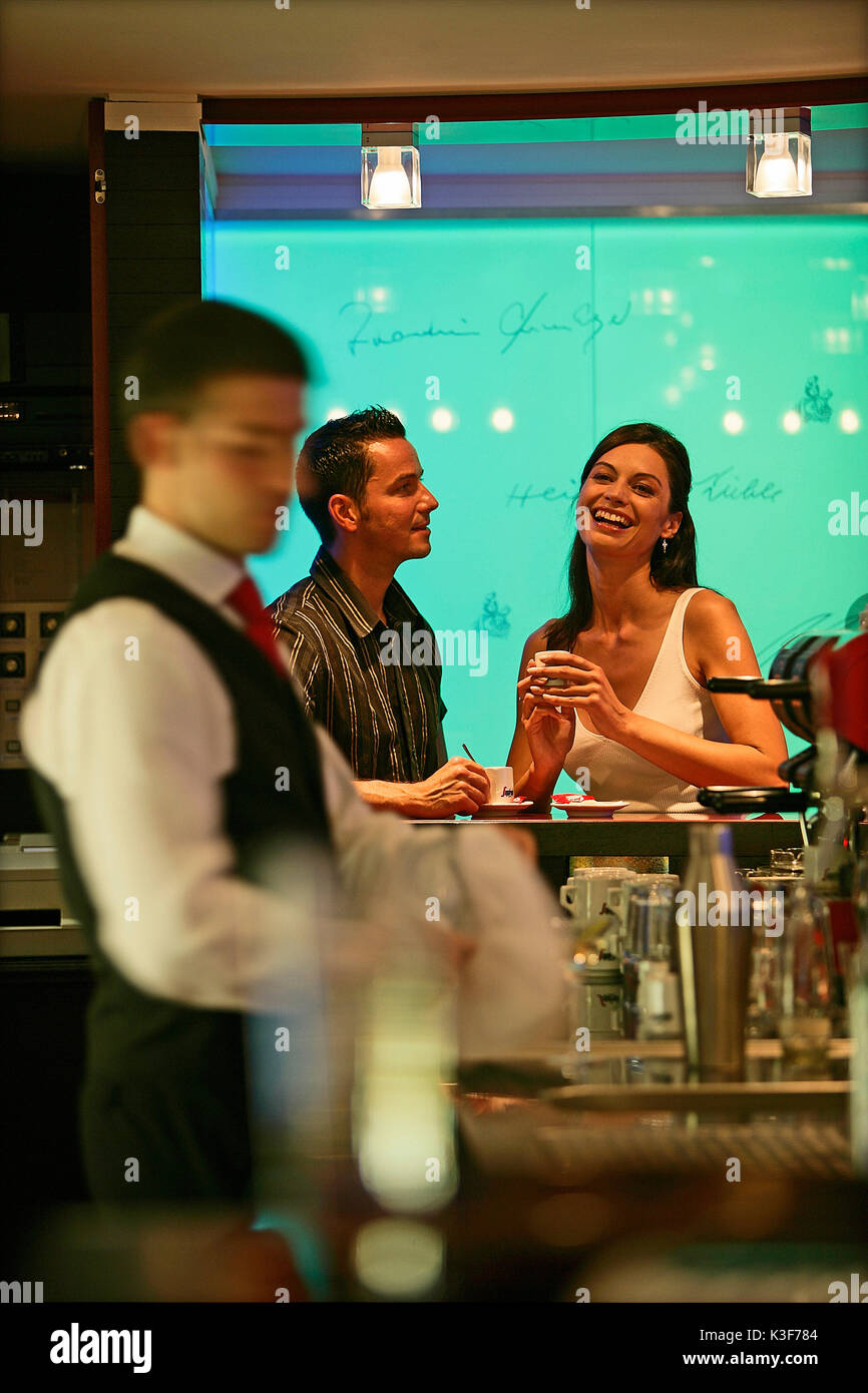 Couple at the bar Stock Photo - Alamy