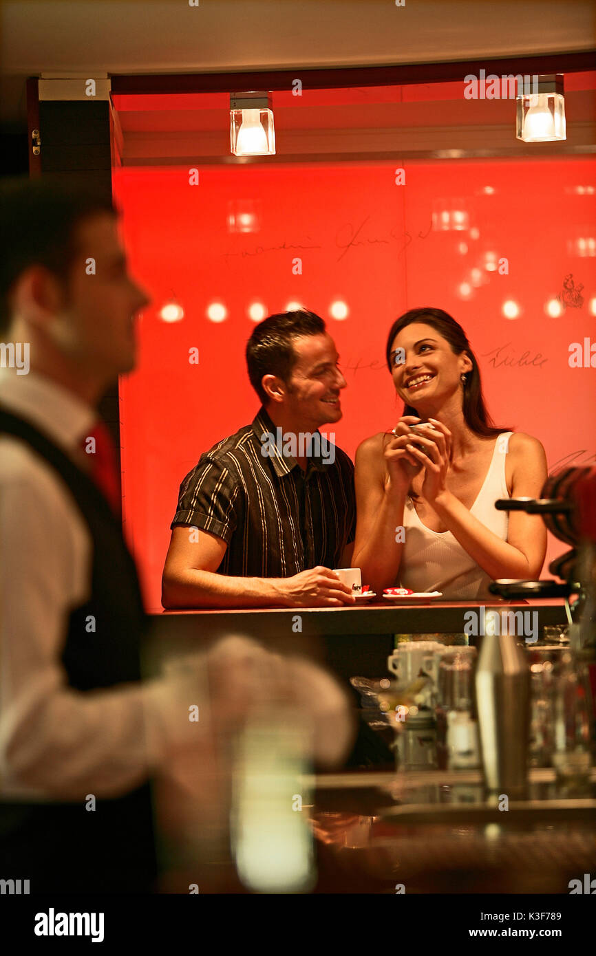 Couple at the bar Stock Photo - Alamy