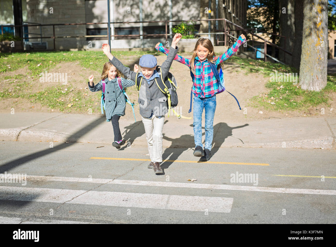 Group children crossing road hi-res stock photography and images - Alamy