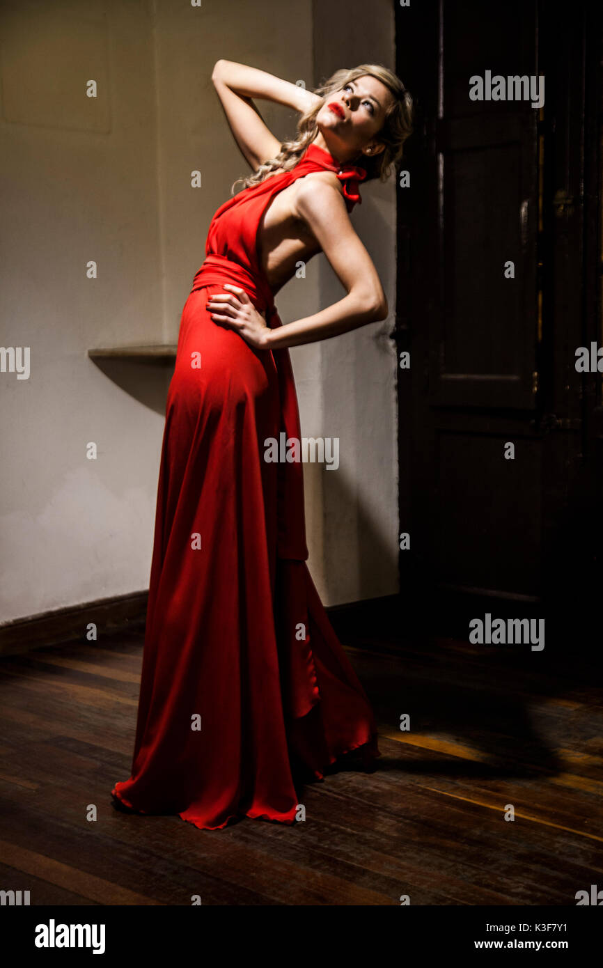 Woman red dress portrait hi-res stock photography and images - Alamy