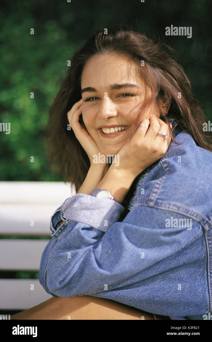 Young woman alone sit on hi-res stock photography and images - Alamy