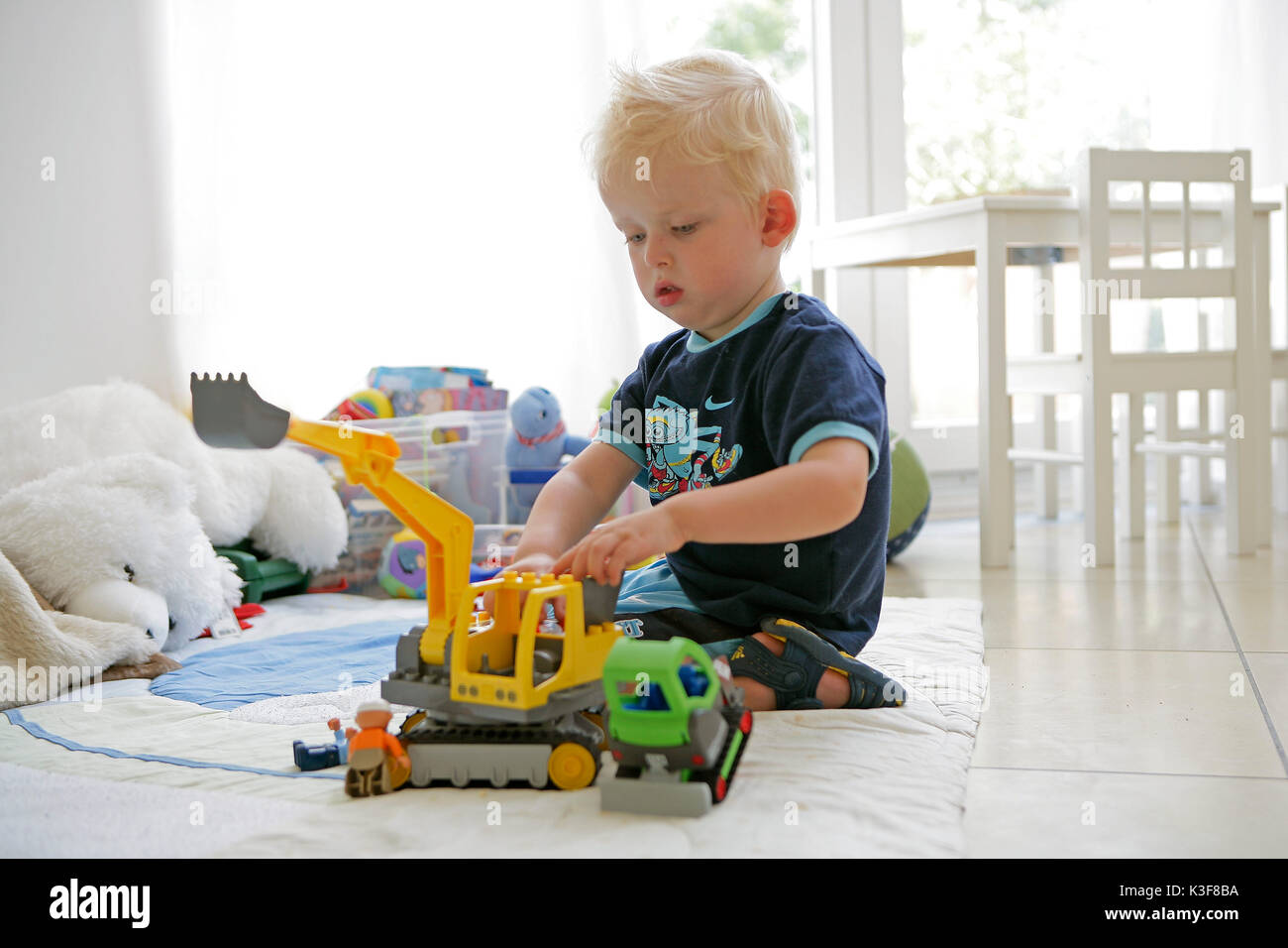 Children playing happily hi-res stock photography and images - Alamy