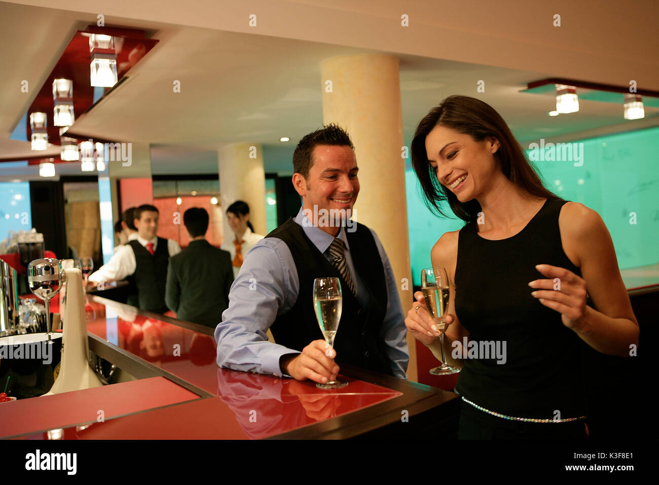 Couple in a bar Stock Photo - Alamy