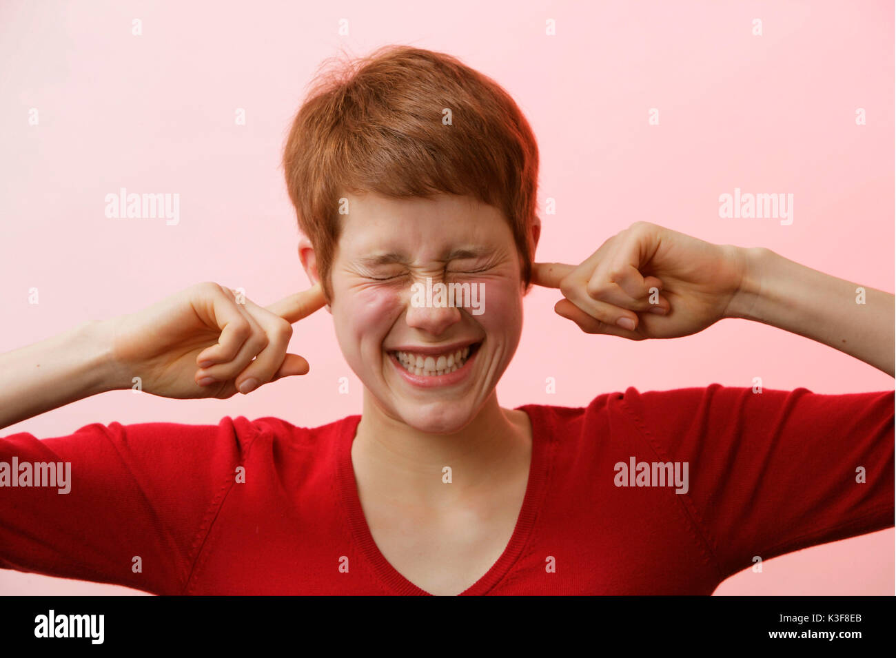Woman ears hands hi-res stock photography and images - Alamy
