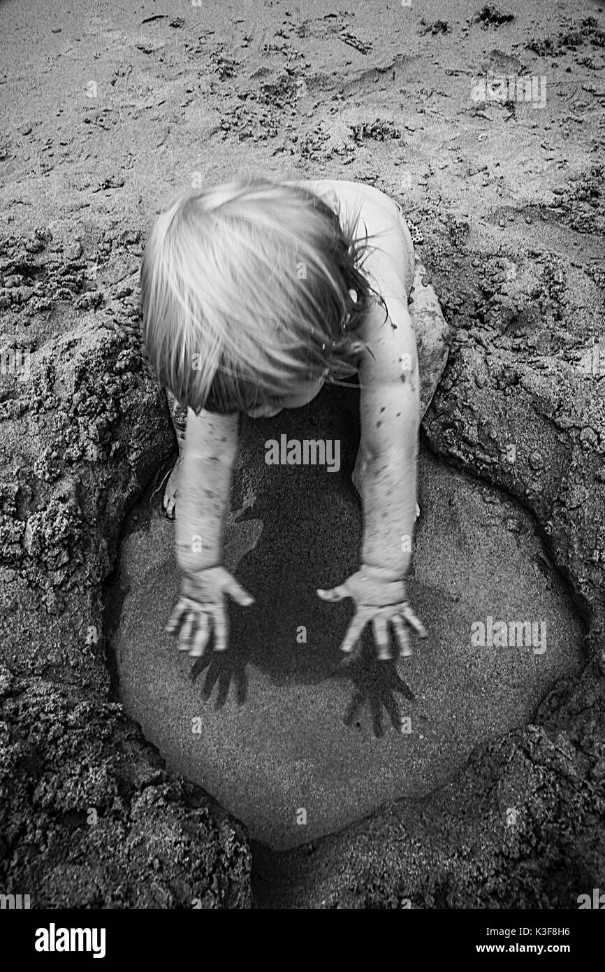 Child playing at beach hi-res stock photography and images - Alamy