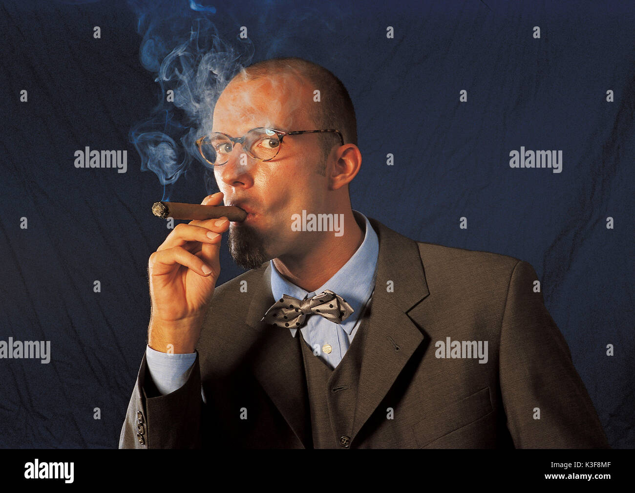 Man suit tie cigar hi-res stock photography and images - Alamy