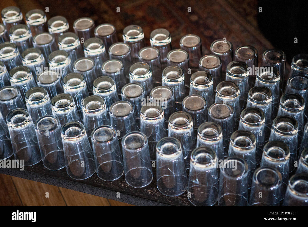 High Angle View of Rows of Drinking Glasses Stock Photo - Alamy