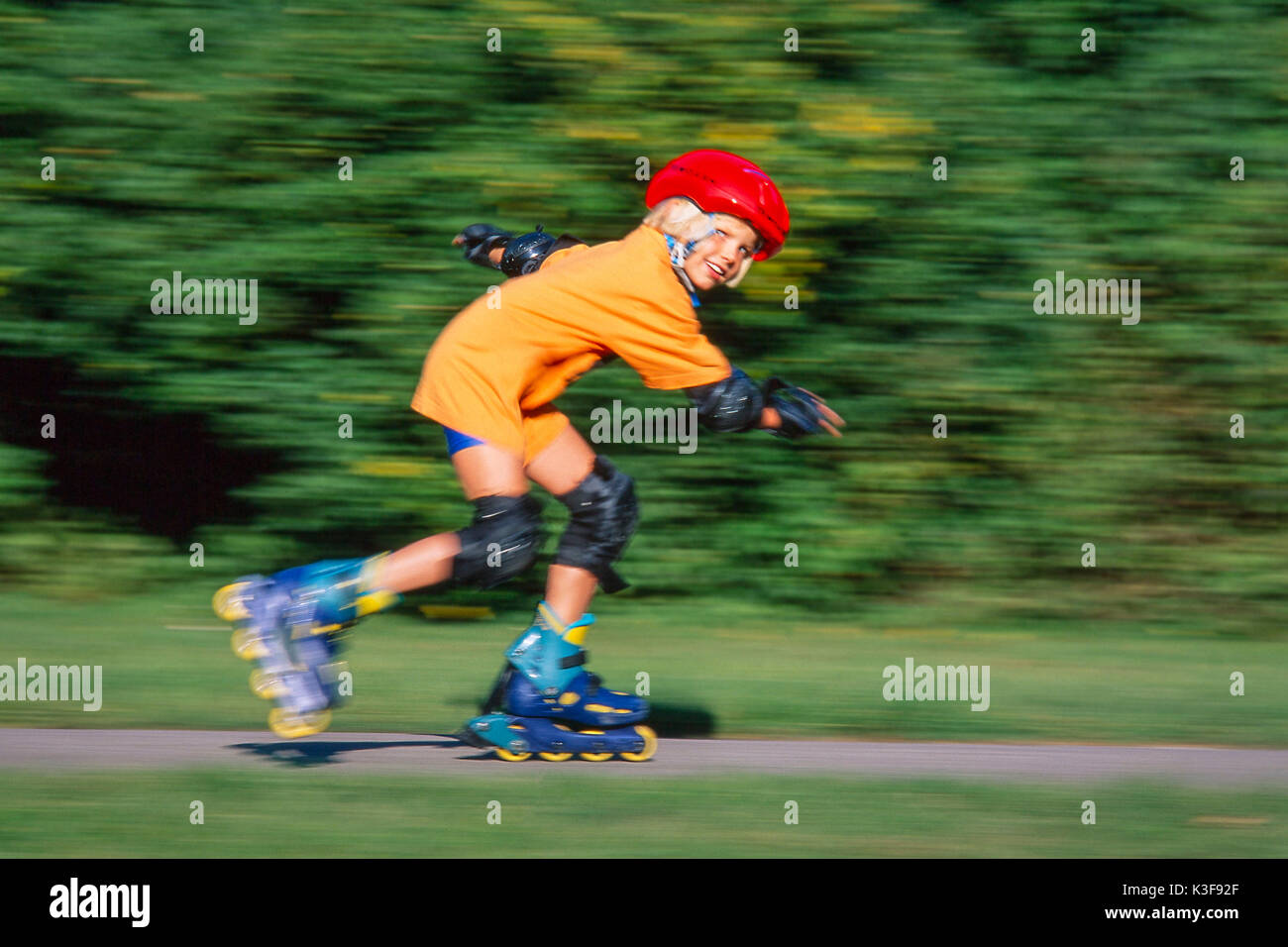 Inline skating child hi-res stock photography and images - Alamy