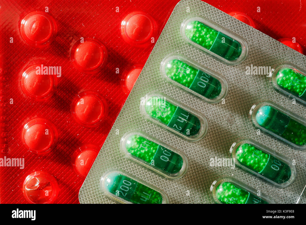 Red tablets in close hi-res stock photography and images - Alamy