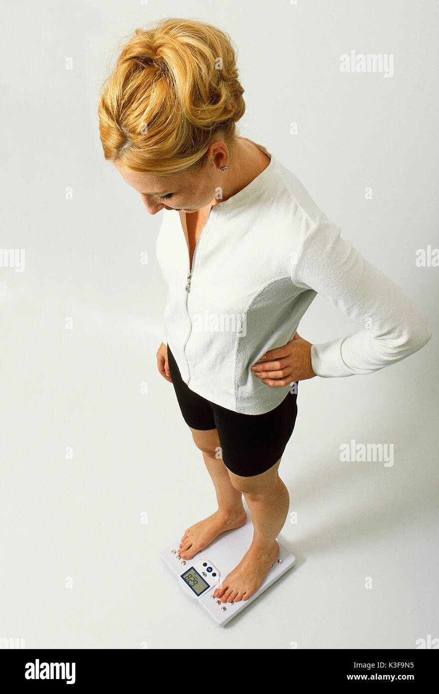 Person scales hi-res stock photography and images - Alamy